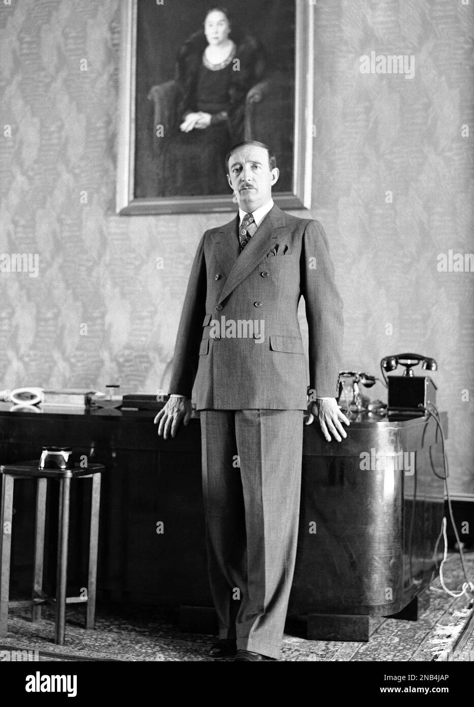 King Zog of Albania at his desk on March 16, 1938. The picture behind ...