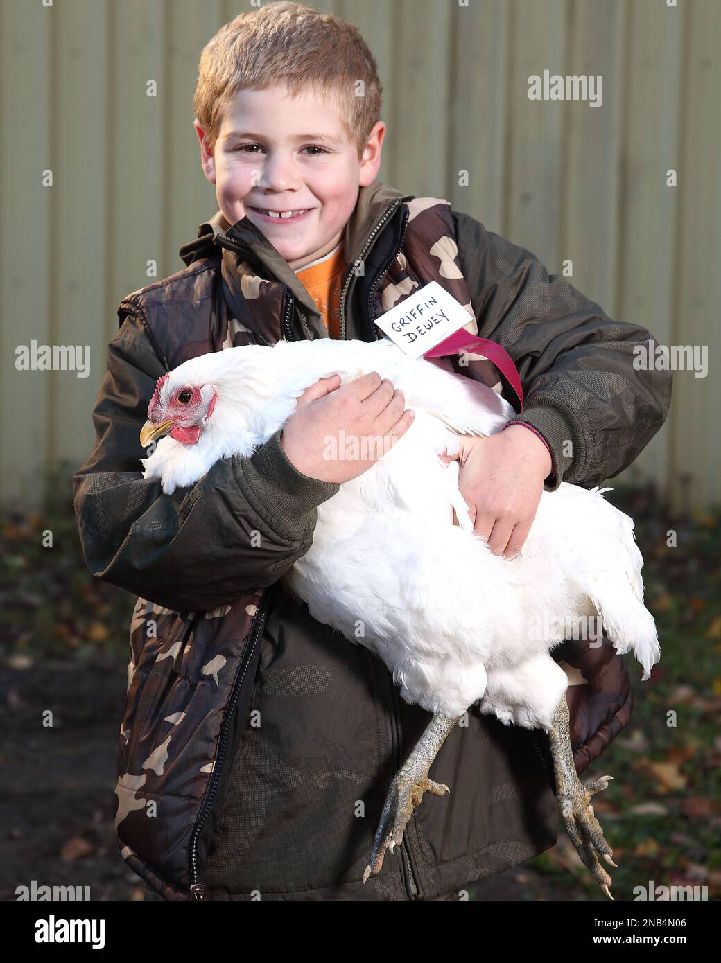 Griffin Dewey poses for a portrait with Shirley, his first prize ...