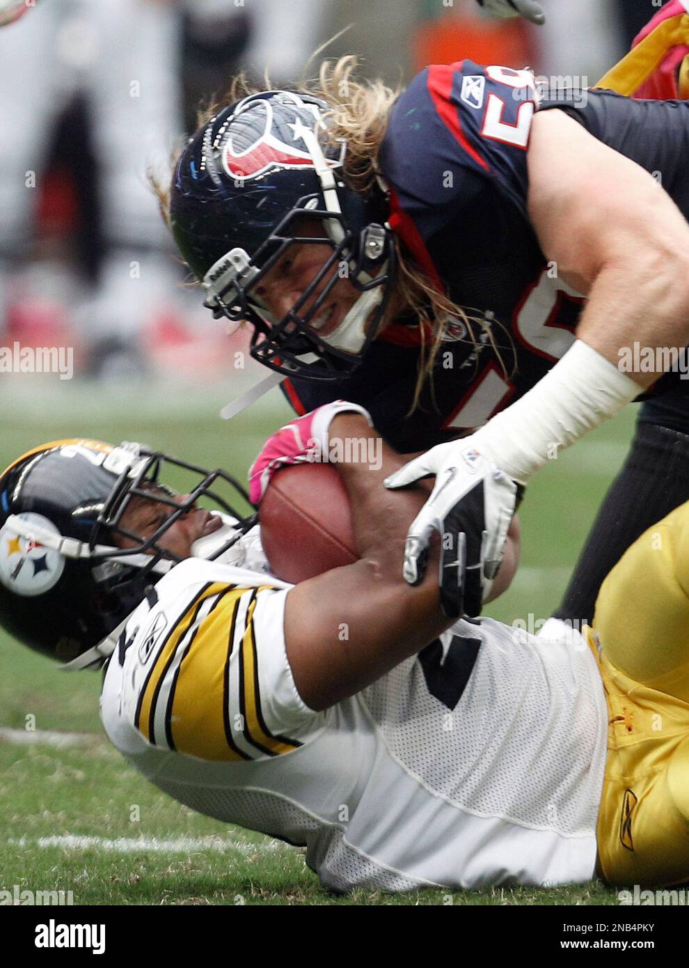 Pittsburgh Steelers running back Mewelde Moore (21) is put to the turf ...
