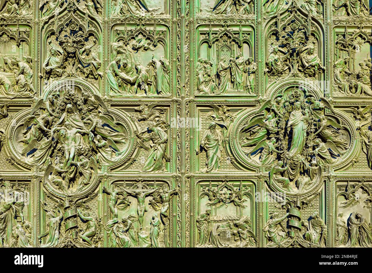 The ornate door of the landmark Milan Cathedral in Milan, Lombardy ...