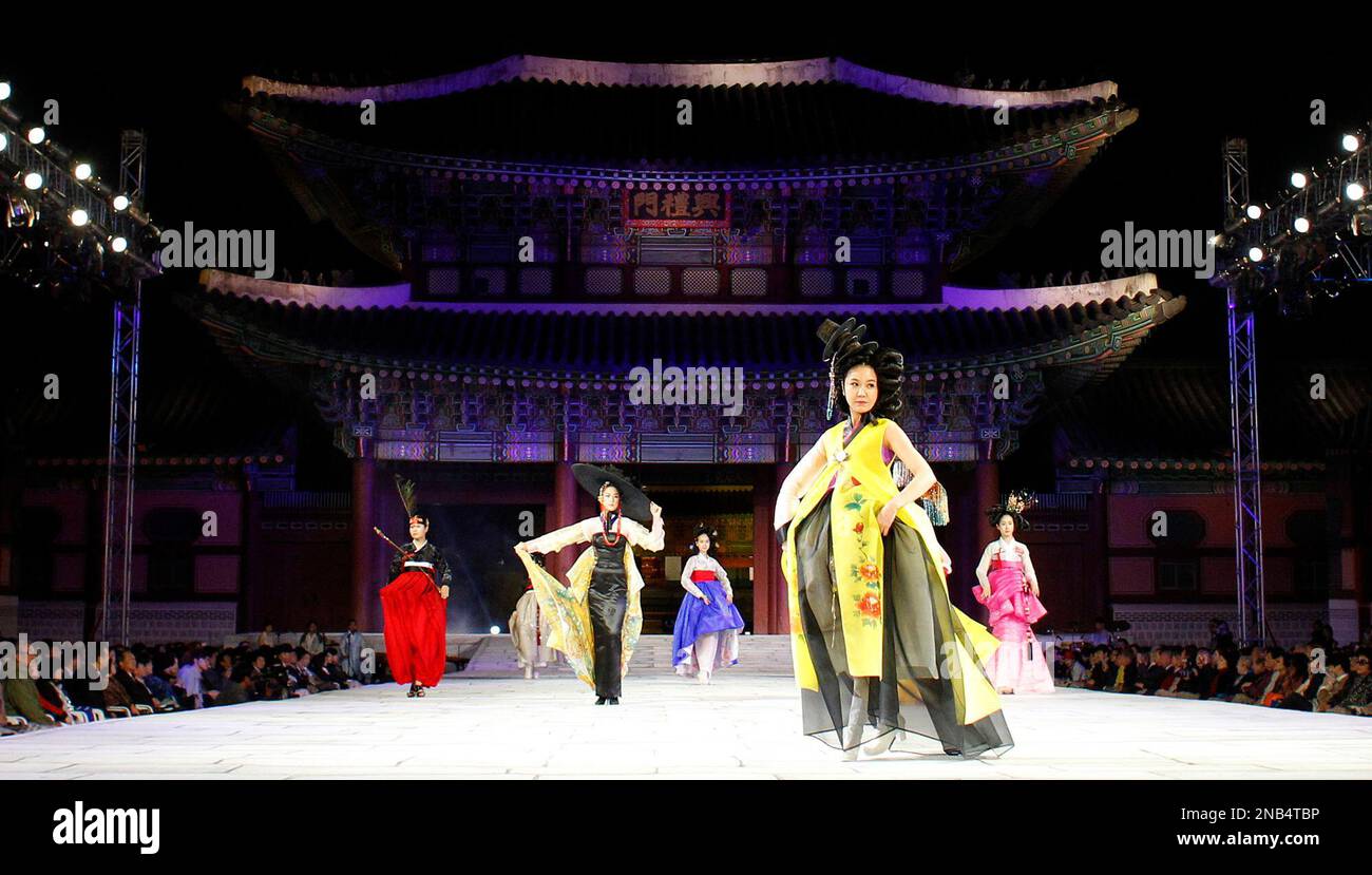 Models wear creations by South Korean designer Kim Hye-soon during the ...