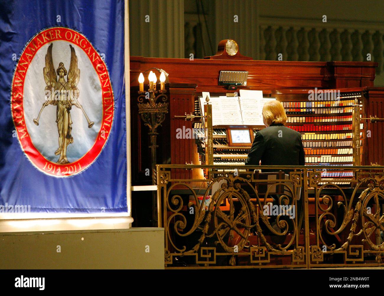Peter Richard Conte plays the Wanamaker organ during a concert with the ...