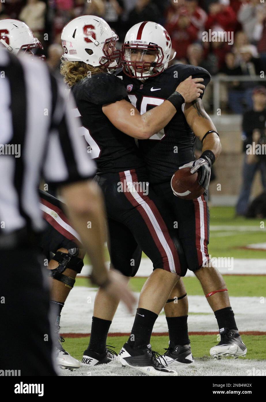 Stanford running back Tyler Gaffney, right, is congratulated by ...