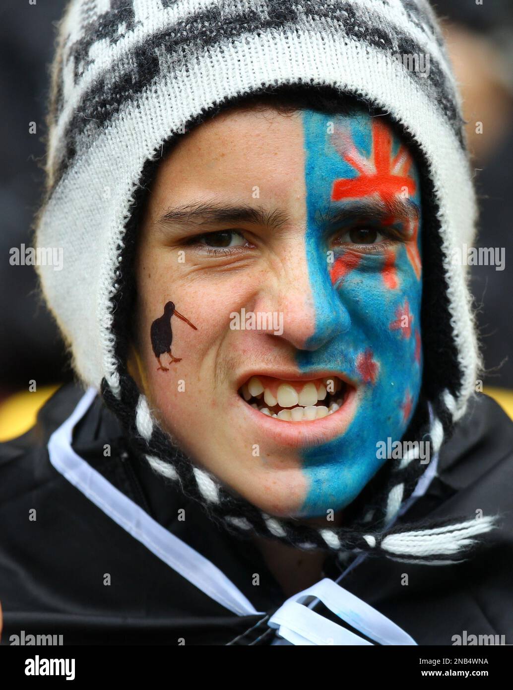 A young New Zealand All Blacks fan poses for the camera ahead of his ...