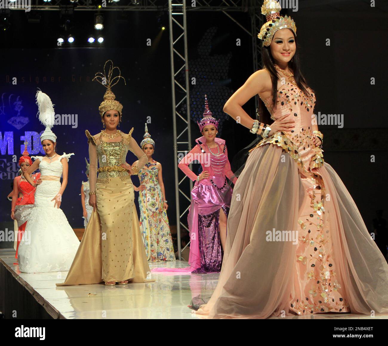 Myanmar models present dresses created by local designers during 1st ...