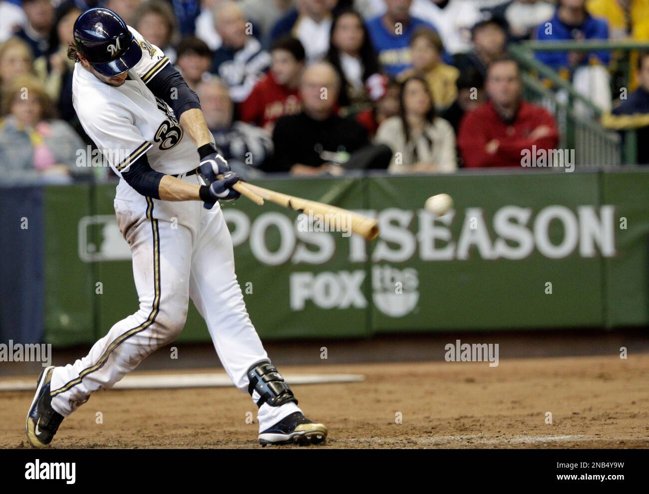 Milwaukee Brewers' Ryan Braun breaks his bat as he hits a single during ...