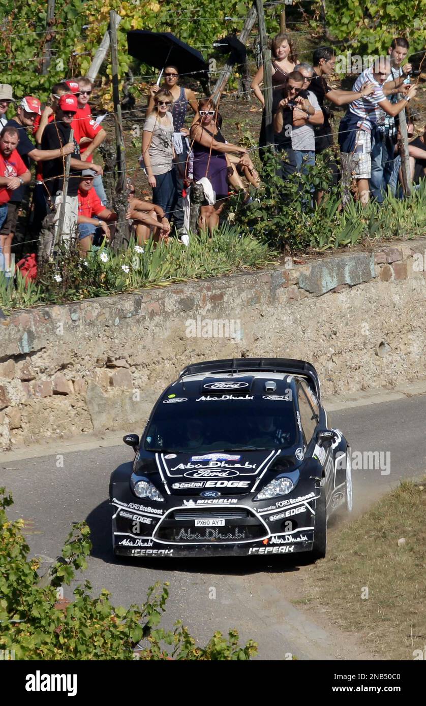 Jari-Matti Latvala and Mikka Antila of Finland steer their Ford Fiesta ...