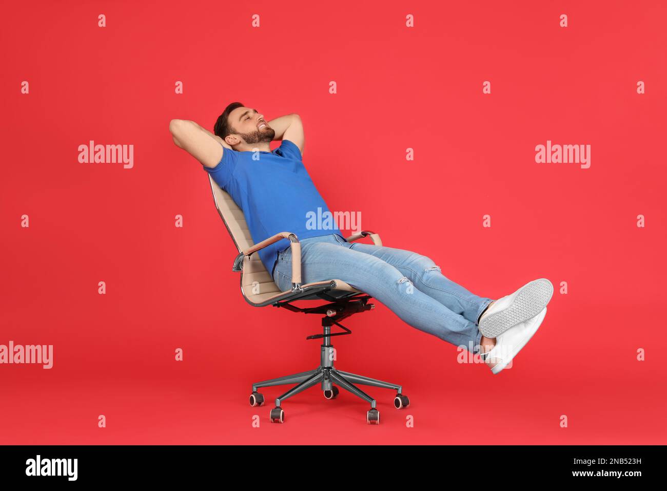Man relaxing in leather chair hi-res stock photography and images - Alamy
