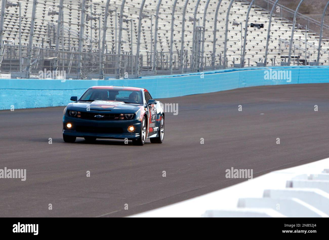 Arizona Gov. Jan Brewer drives an official pace car on the new track ...