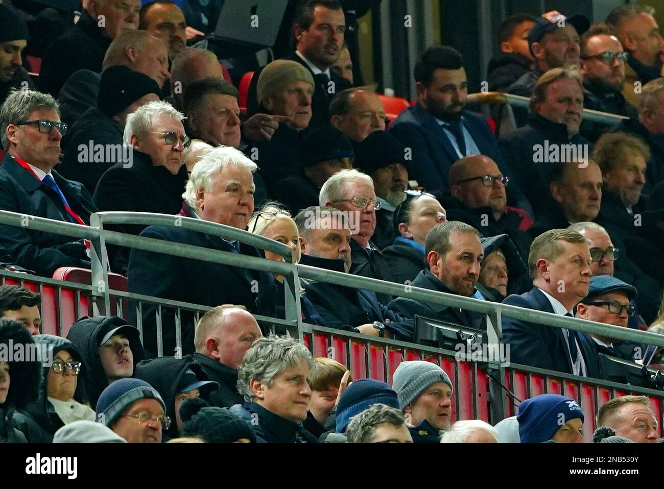 Everton board of directors Bill Kenwright (centre row, left), Denise ...