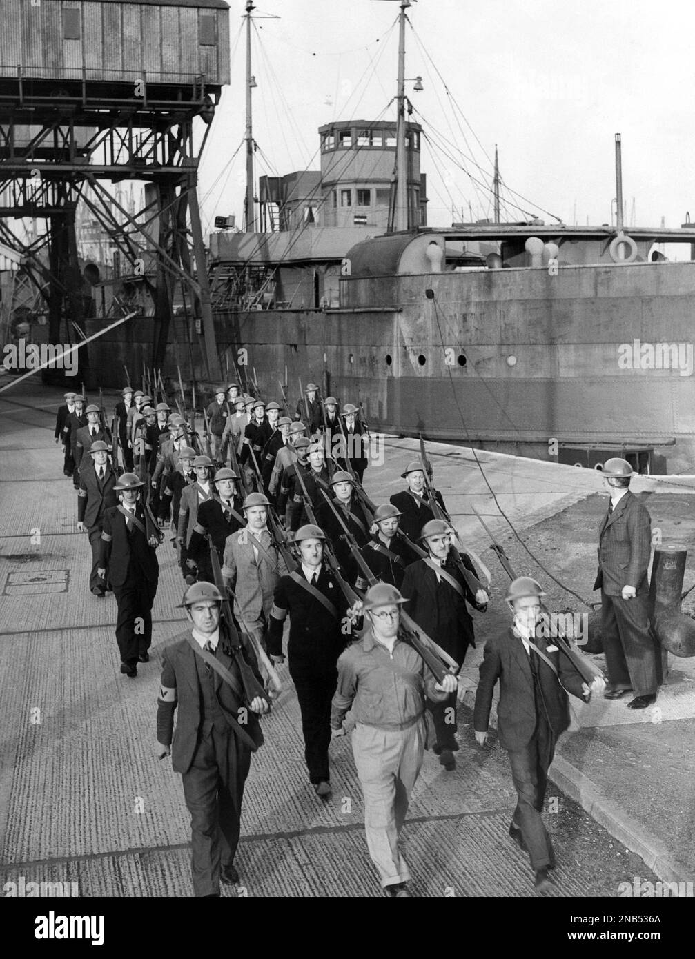 Members of the British Home Guard are seen marching at one of the ...