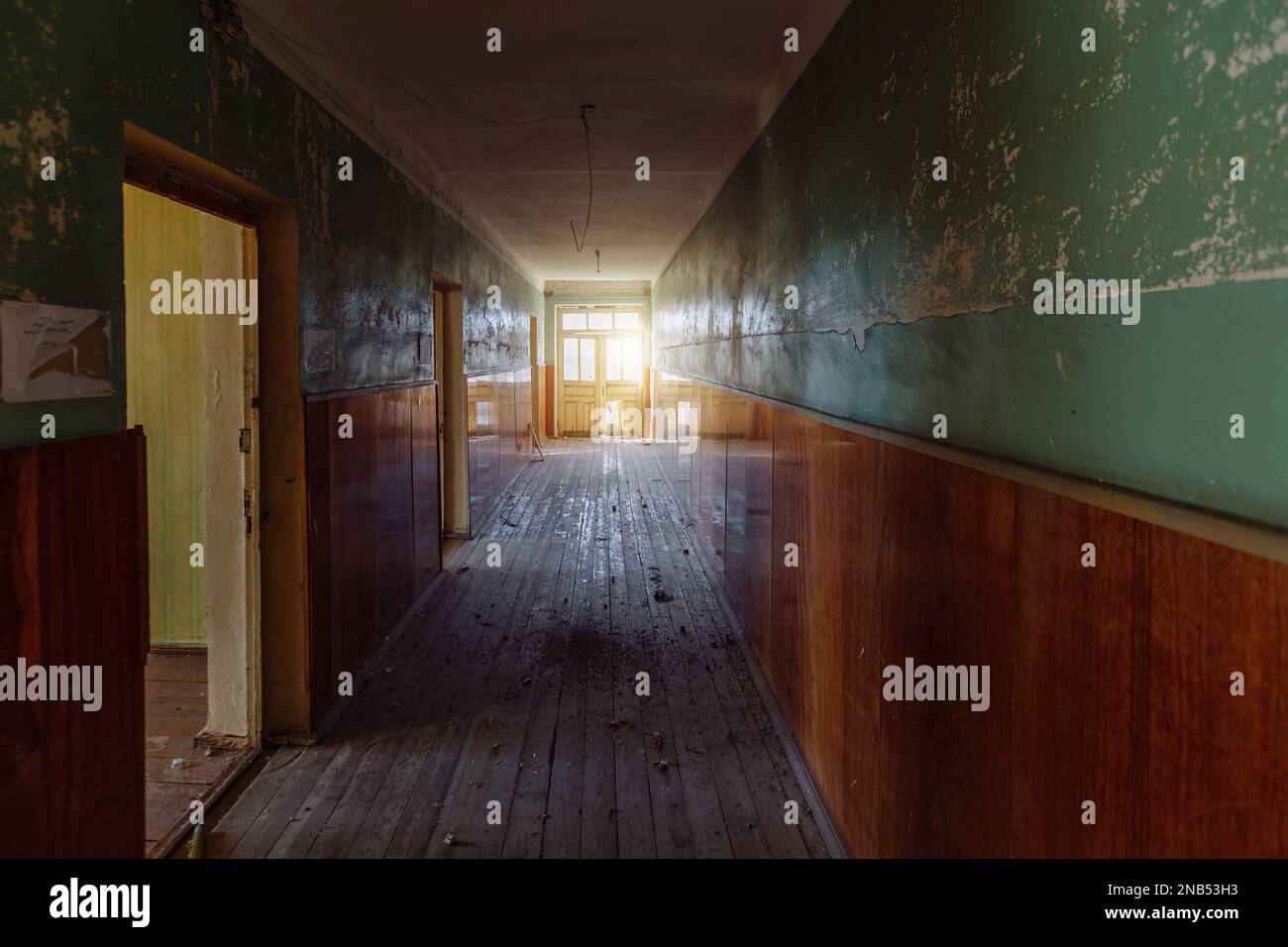 Dark dirty corridor of old abandoned building Stock Photo - Alamy