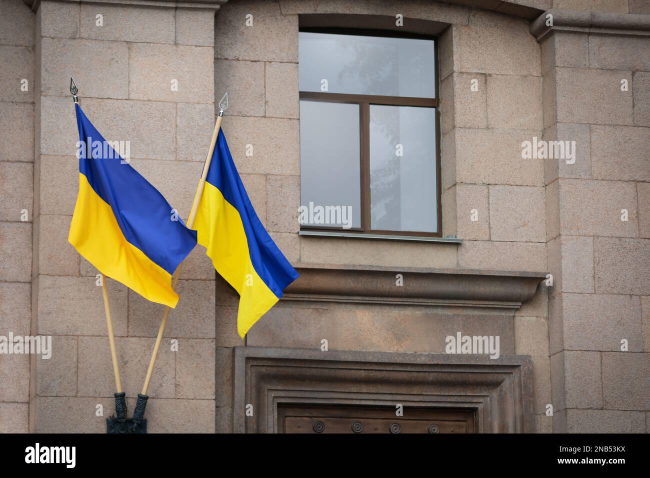 National flags of Ukraine on building facade Stock Photo - Alamy