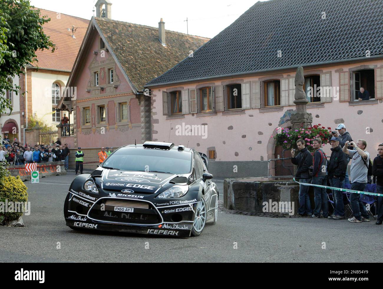 Jari-Matti Latvala and Mikka Antila of Finland steer their Ford Fiesta ...