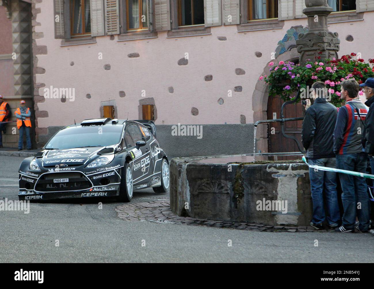 Jari-Matti Latvala and Mikka Antila of Finland steer their Ford Fiesta ...