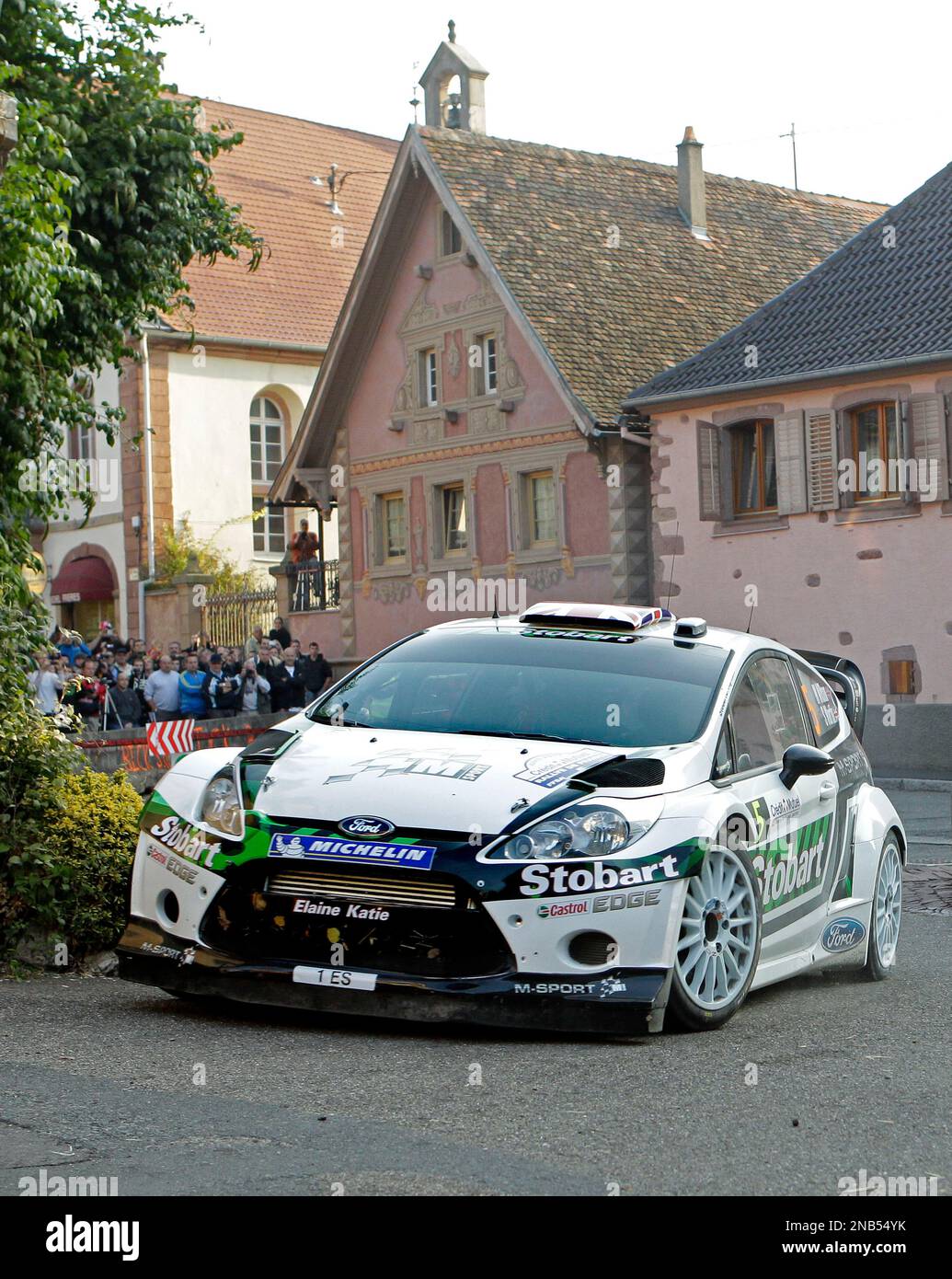 Matthew Wilson and Scott Martin of Great Britain steer their Ford ...