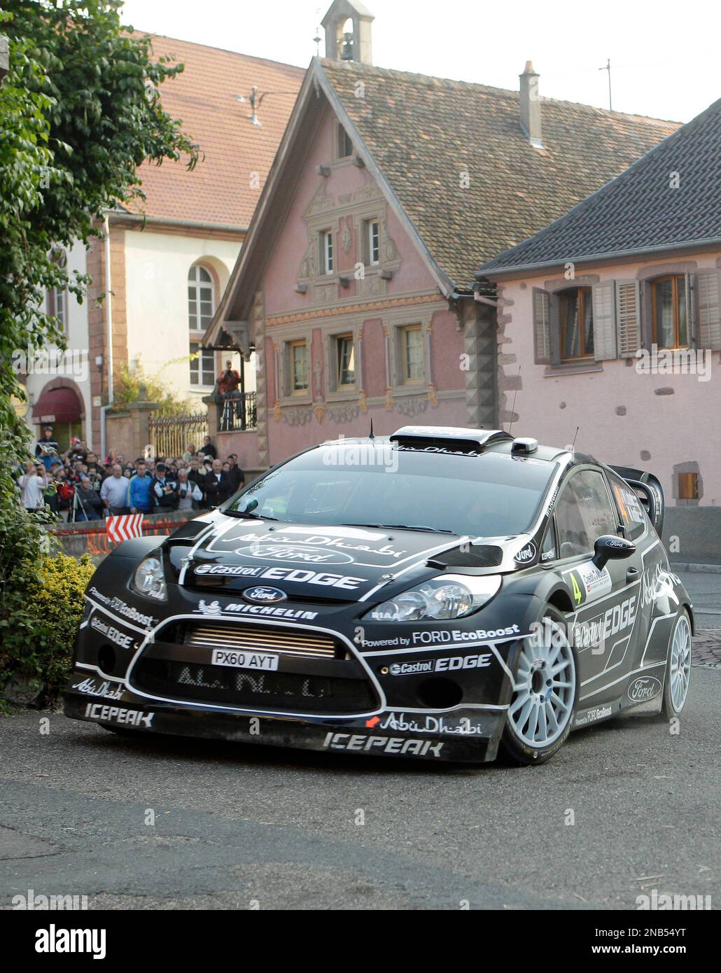 Jari-Matti Latvala and Mikka Antila of Finland steer their Ford Fiesta ...