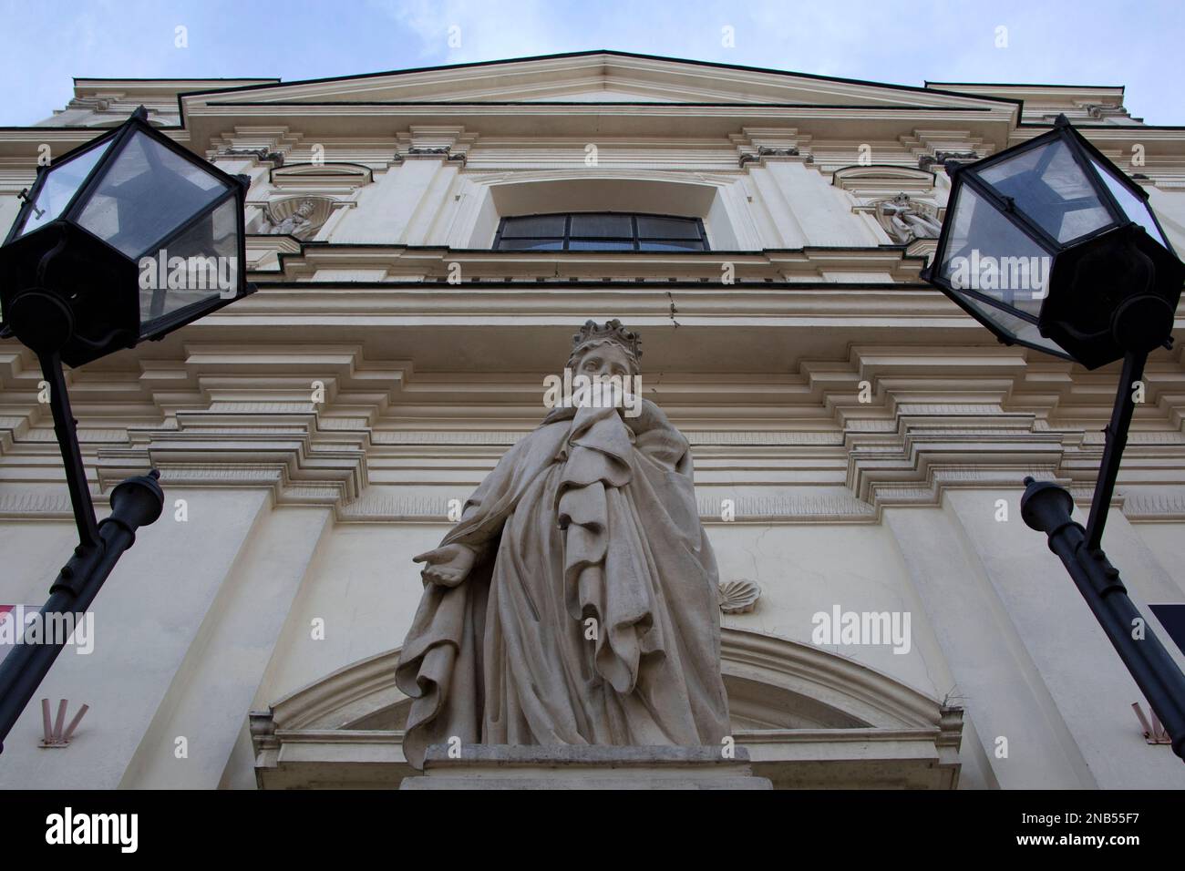 Statue of the virgin Mary on the baroque front of the catholic Holy ...