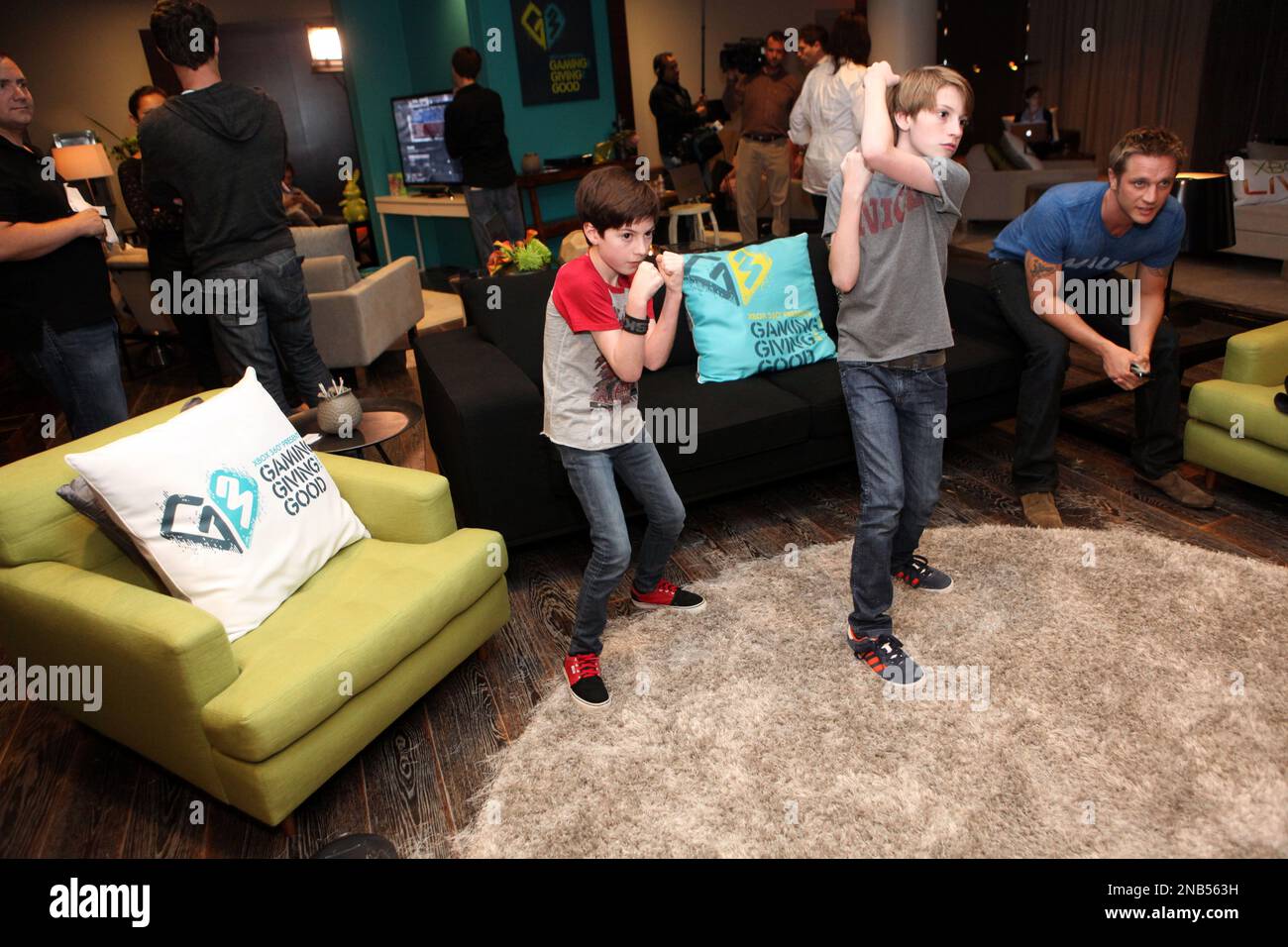 Mason Cook, left, his brother Lane Cook, center, and Devon Sawa are ...