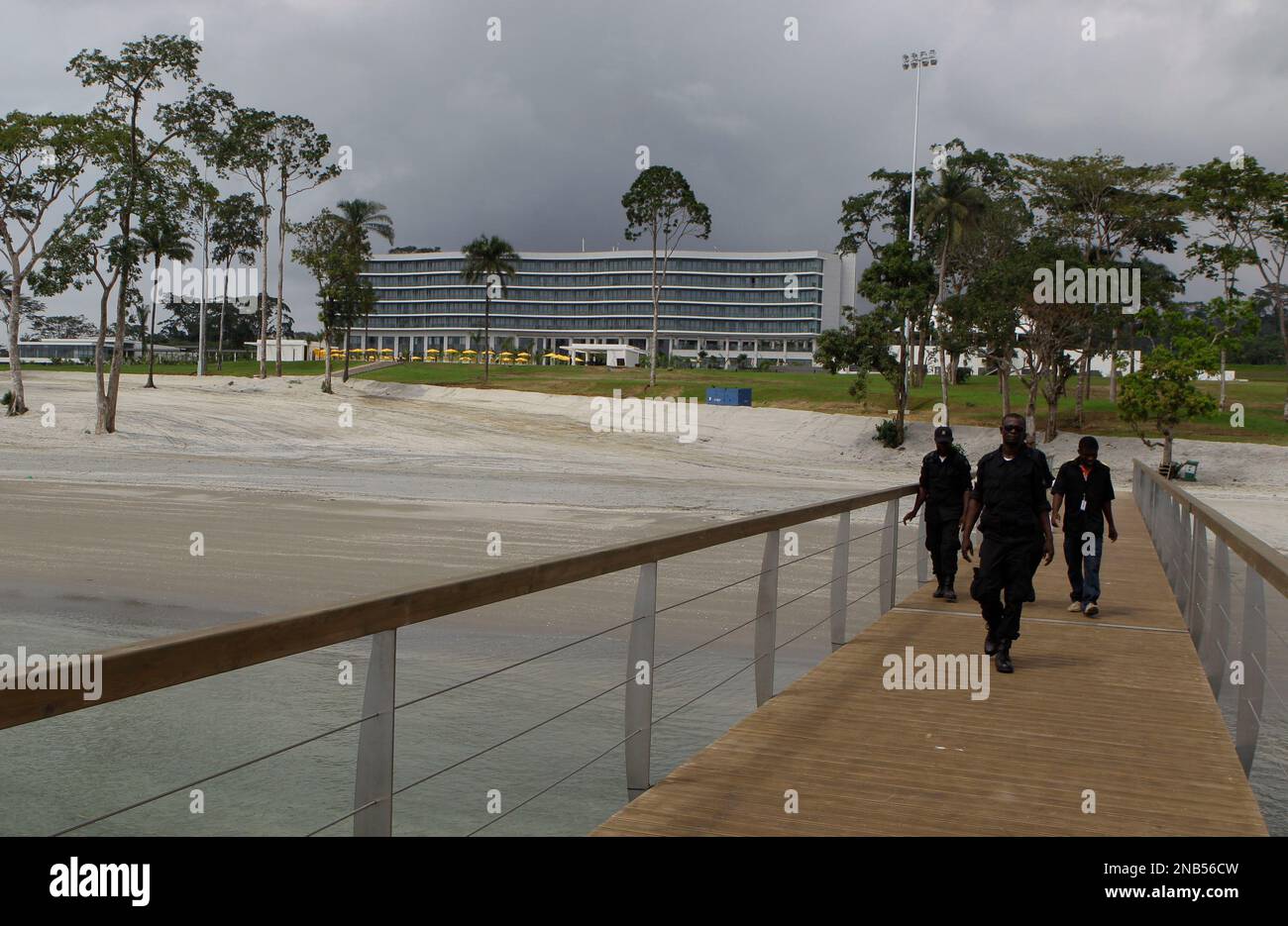 In this July 4, 2011 photo, police officers walk across a bridge in ...