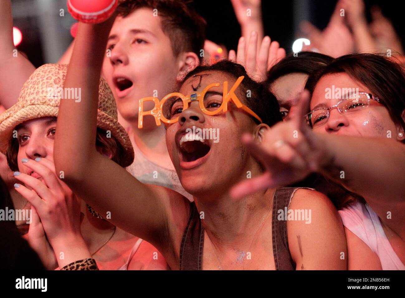 Fans watch Brazilian singer Pitty perform during the Rock in Rio music ...
