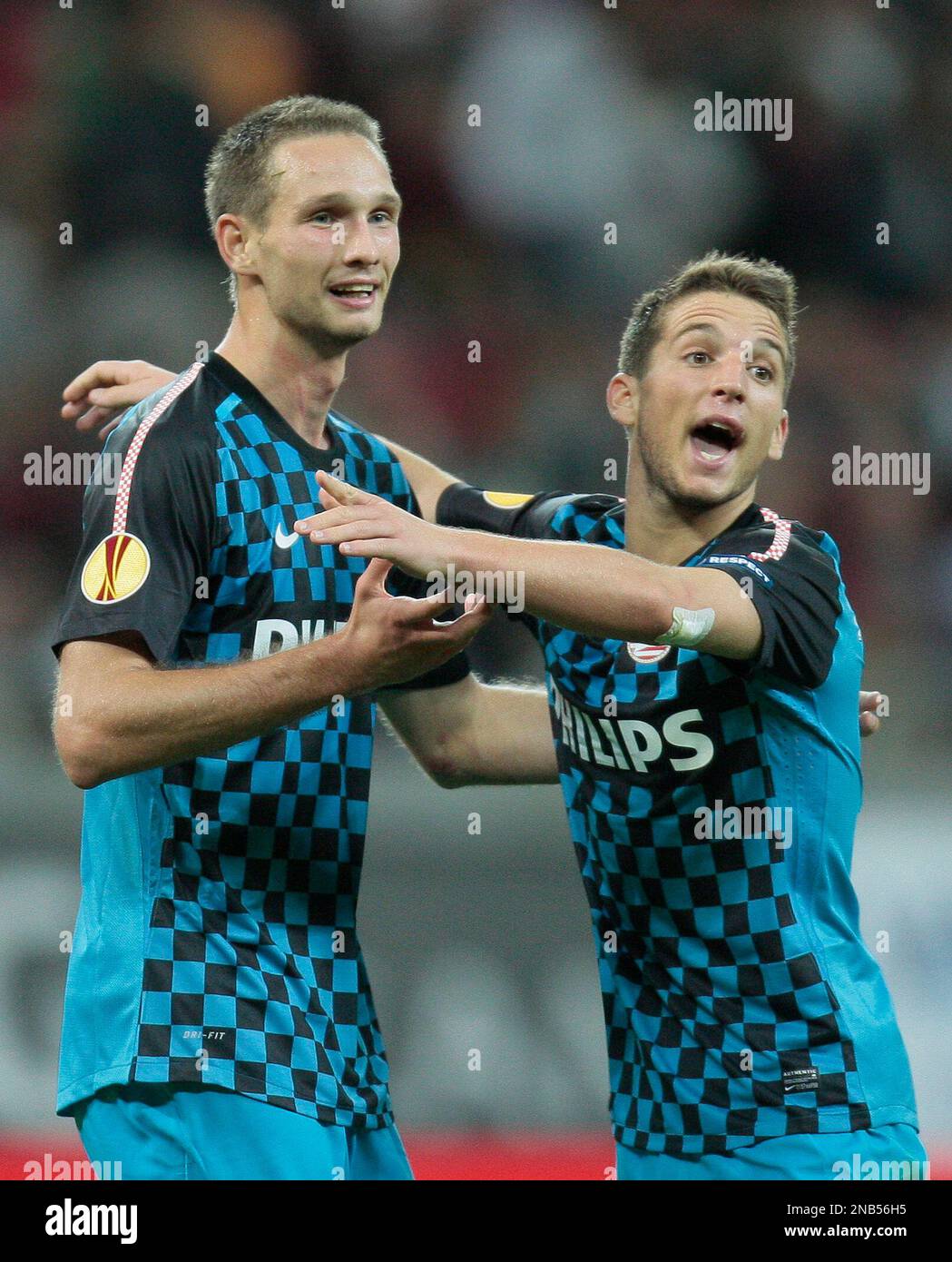 PSV Eindhoven's Tim Matavz, left, celebrates with Dries Mertens, right ...