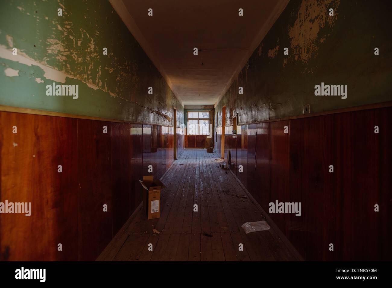 Dark dirty corridor of old abandoned building Stock Photo - Alamy