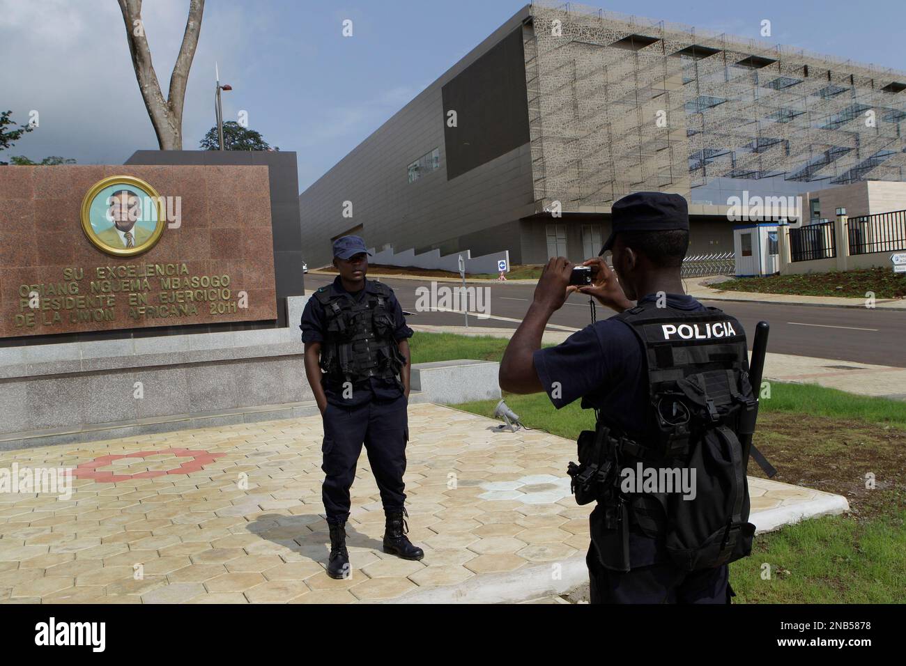 In this July 4, 2011 photo, police officers photograph each other in ...