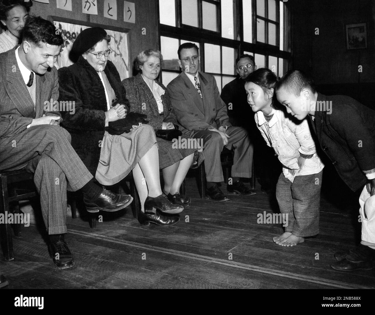 In this image provided by the U.S. Army, two Japanese children from the ...