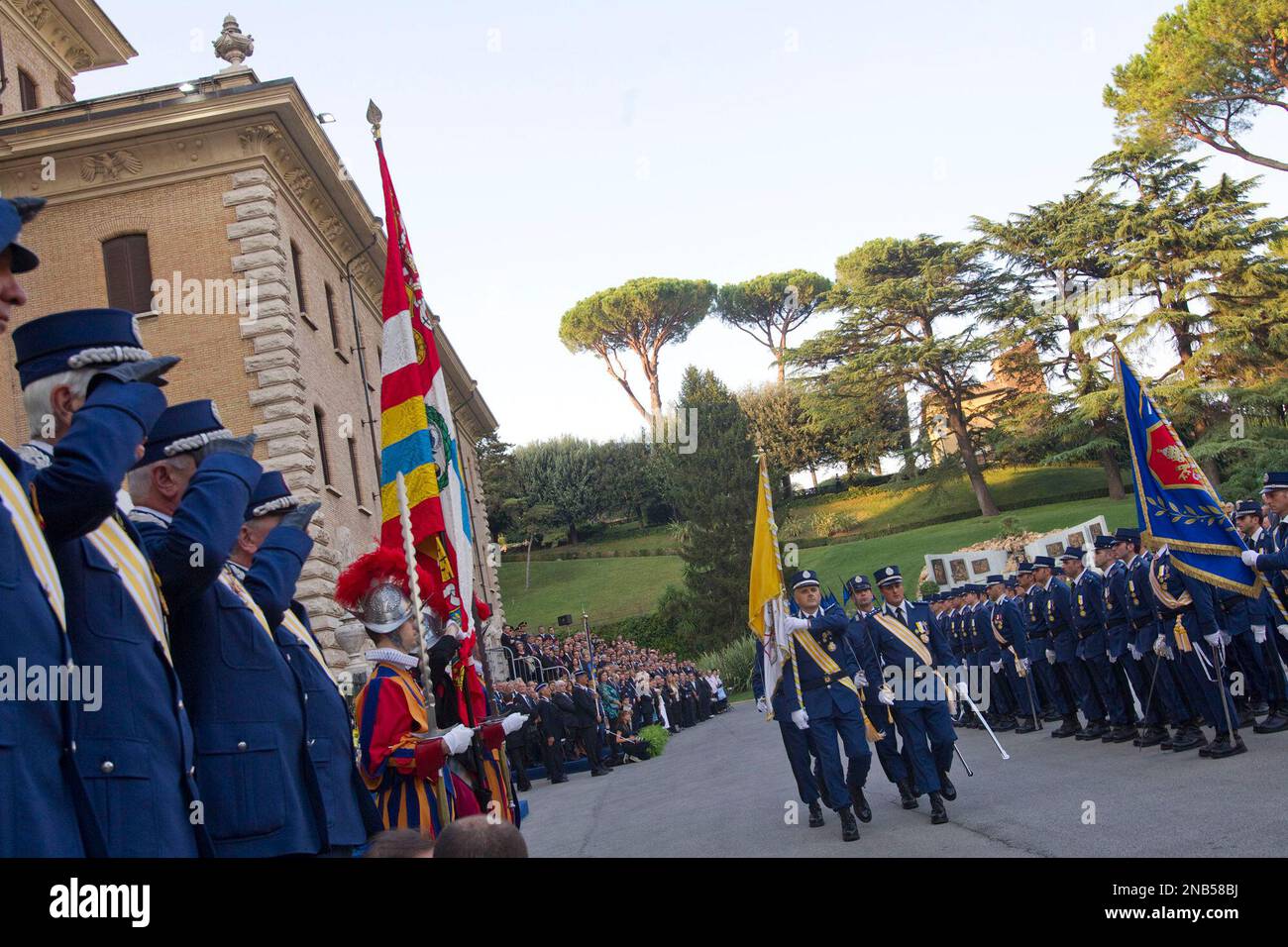 Members of the Vatican police corps salute the arrival of the Vatican ...