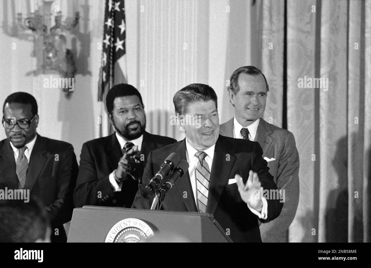 President Ronald Reagan addresses black appointees at the White House ...