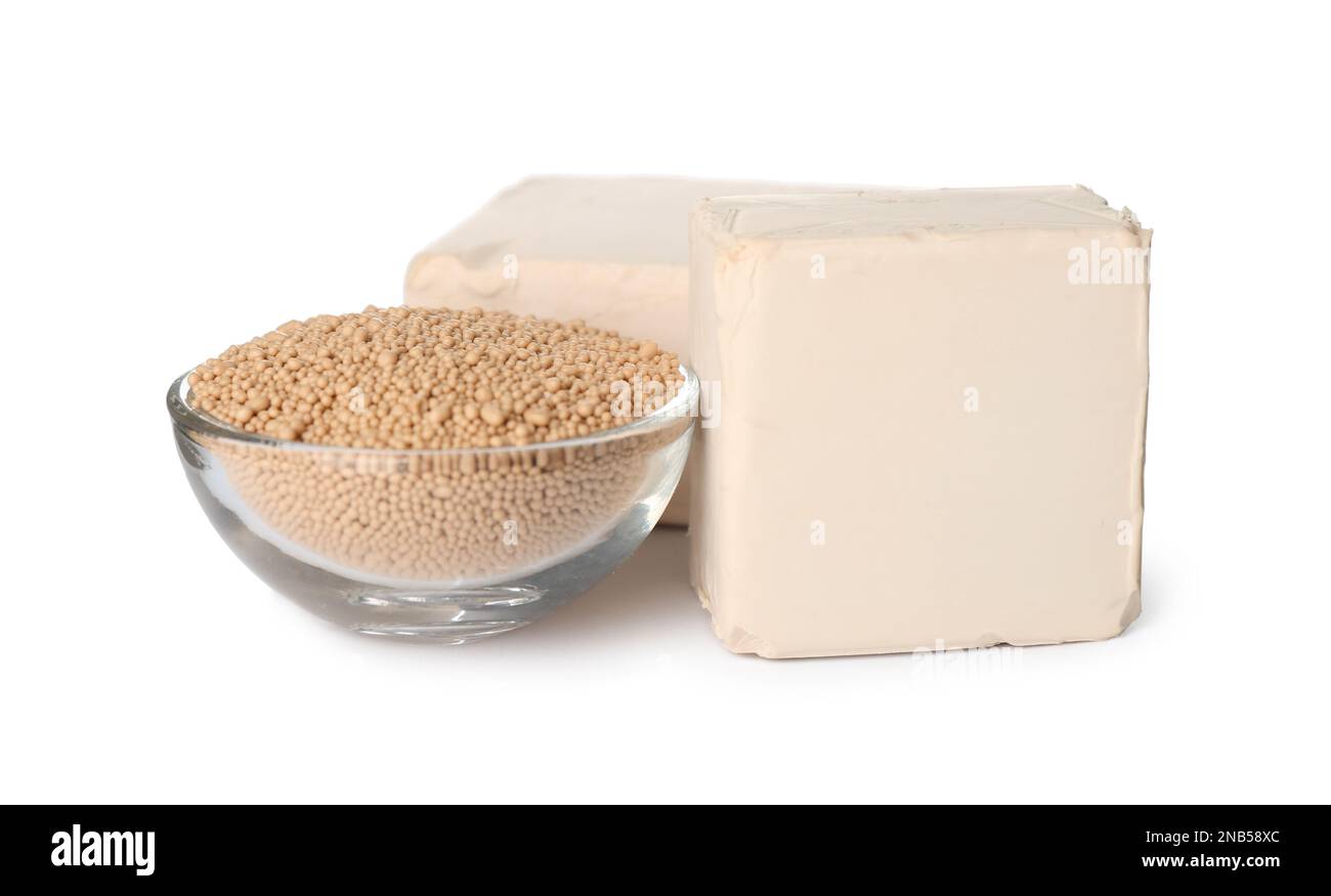 Compressed and granulated yeast on white background Stock Photo - Alamy