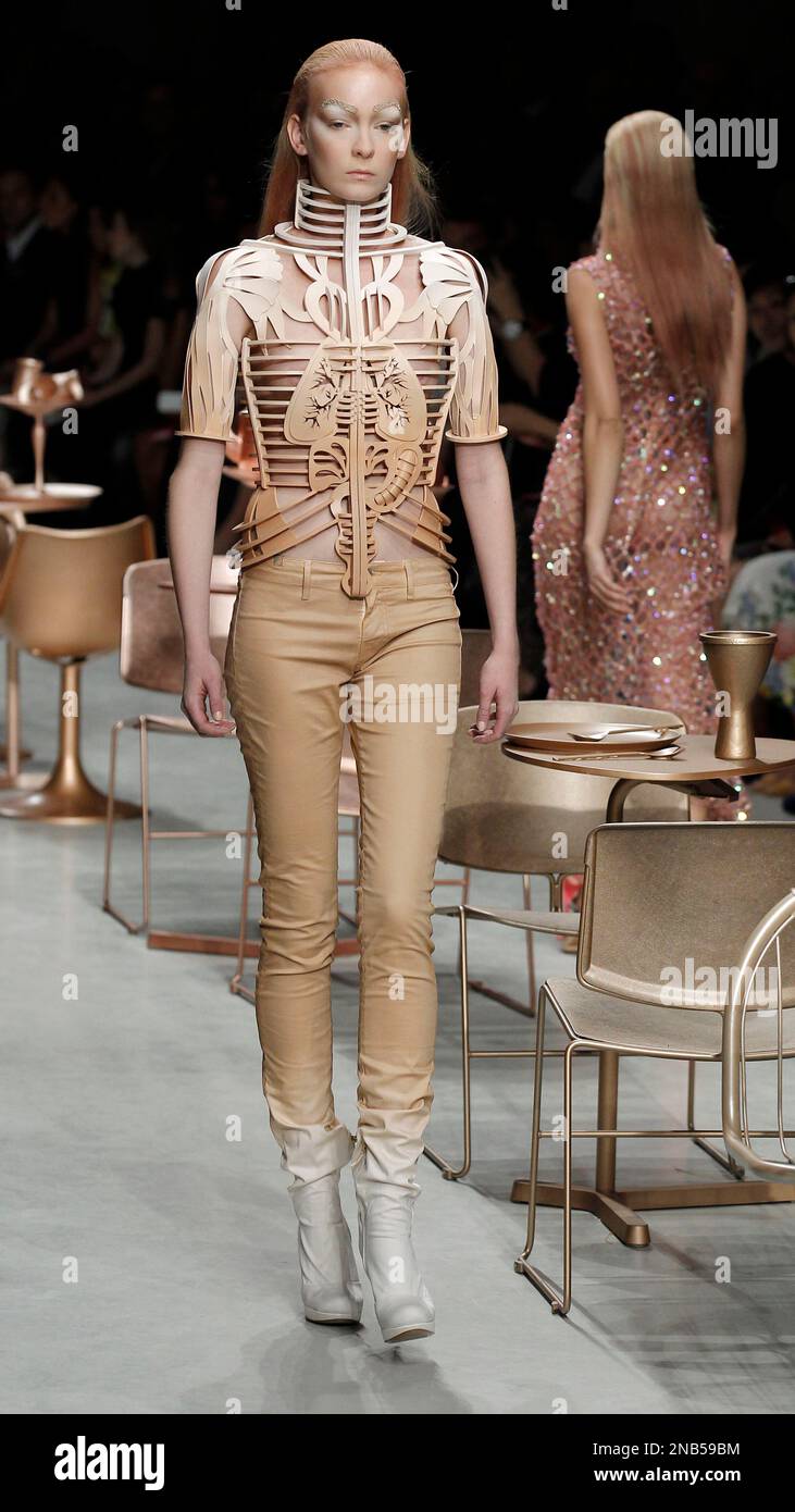 A model wears a creation for Indian fashion designer Manish Arora's ...