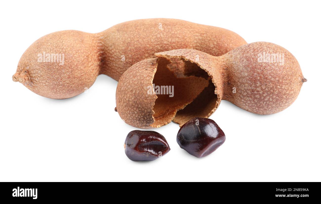 Delicious ripe tamarinds on white background. Exotic fruit Stock Photo ...