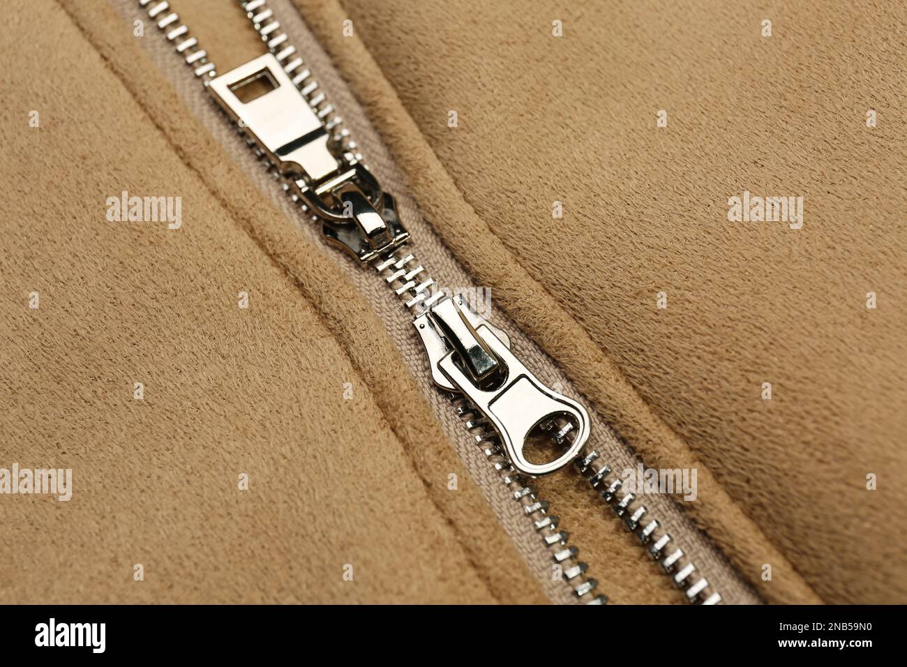 Beige jacket hi-res stock photography and images - Alamy