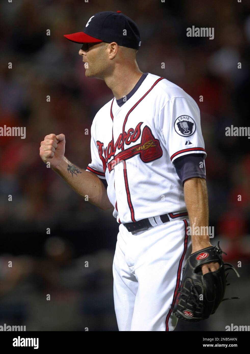 Atlanta Braves starting pitcher Tim Hudson pumps his fist after ...