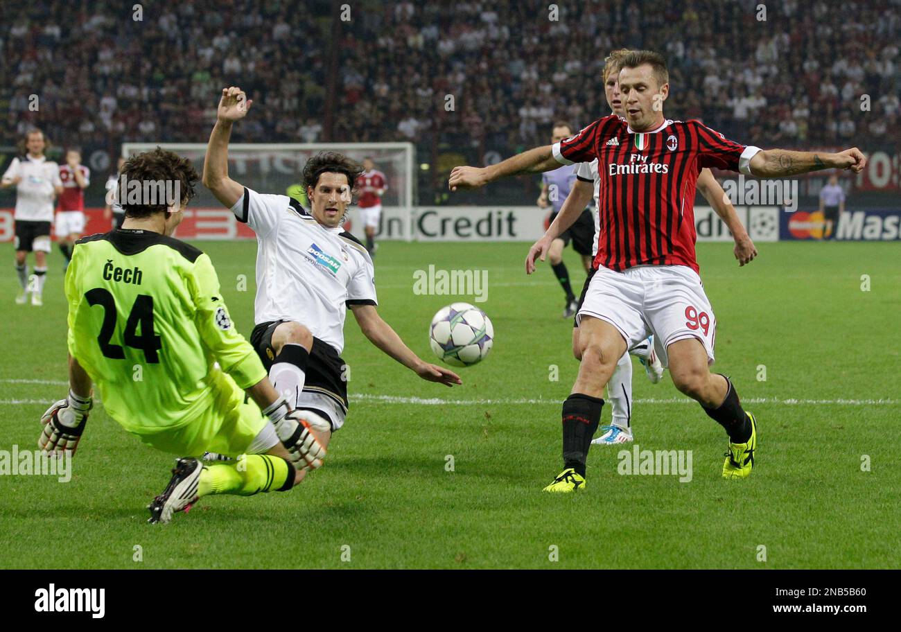 AC Milan forward Antonio Cassano, right, scores during a Champions ...