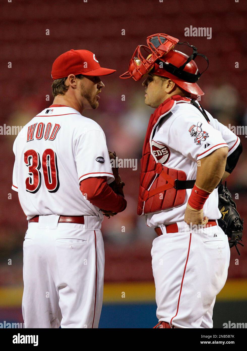Cincinnati Reds starting pitcher Travis Wood (30) talks with catcher ...