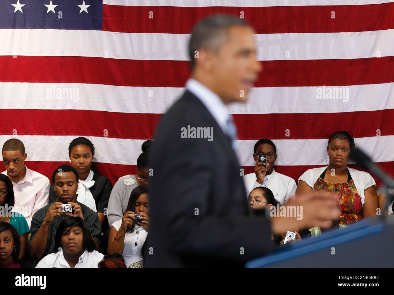 Students listen as President Barack Obama delivers his third annual ...