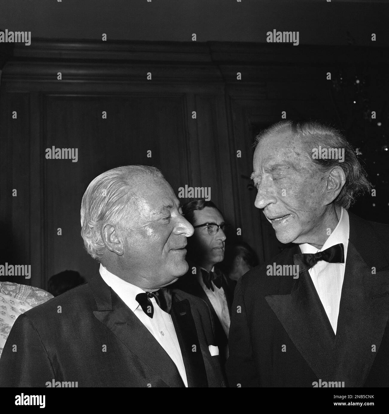 Charles Clore, millionaire financier, left, chats with American ...