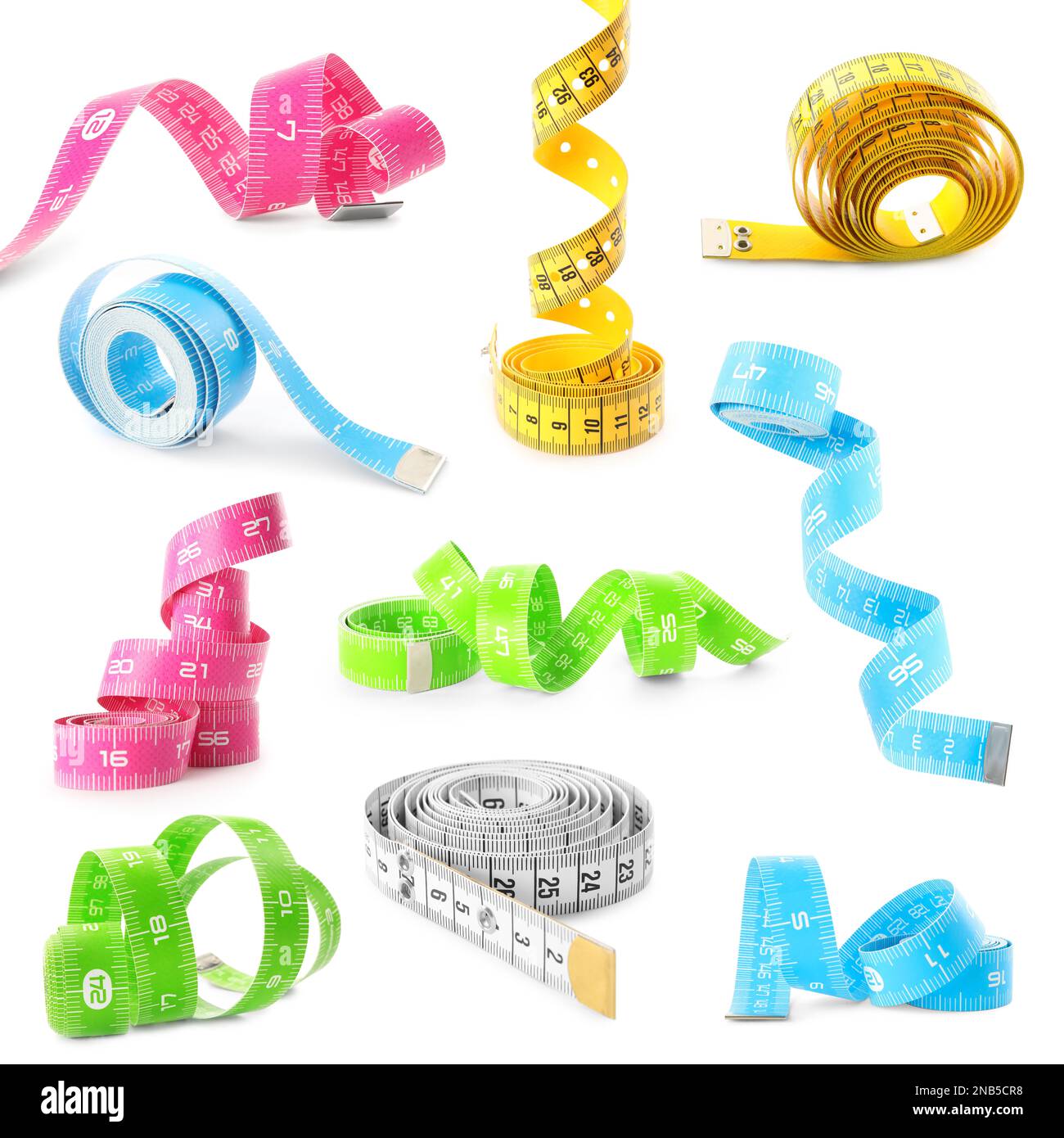Set with different measuring tapes on white background Stock Photo - Alamy