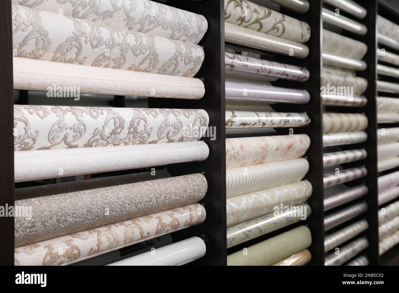 Assortment of stylish wall papers on display in shop Stock Photo - Alamy