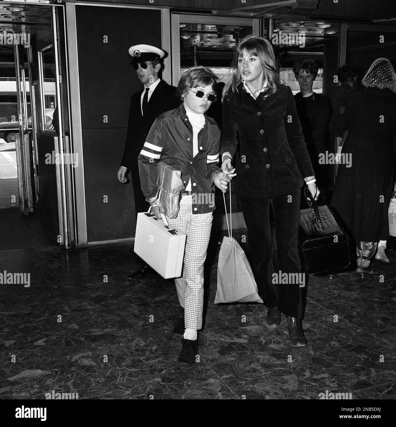 Swedish film star Britt Ekland and her brother Karl, 12, at Heathrow ...