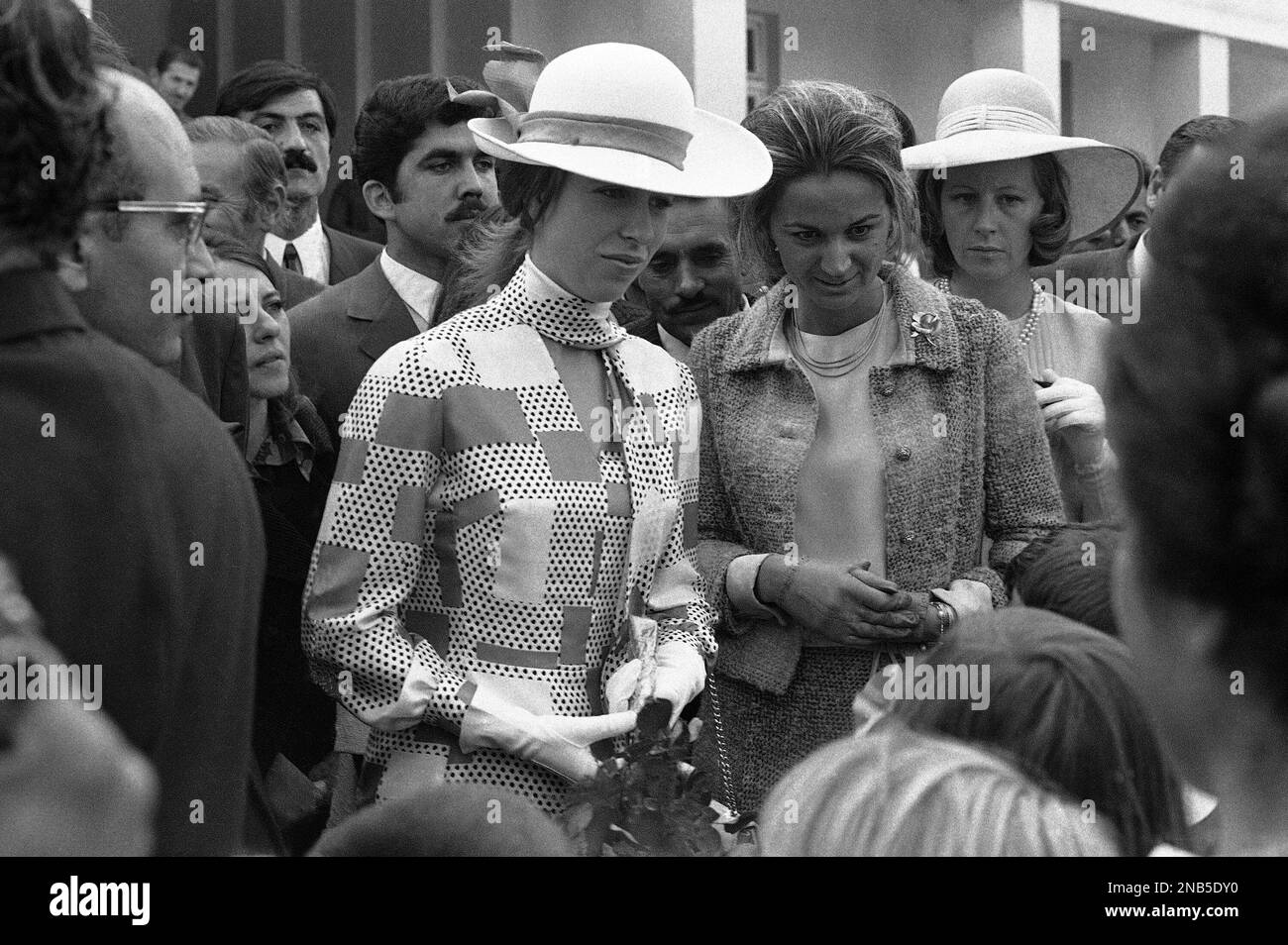 Britain’s Princess Anne and her Turkish escort Belkis Varsan, right ...