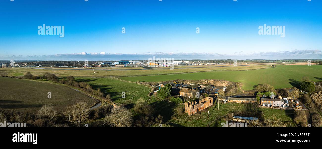 A panorama of a beautiful landscape with Someries Castle and Luton ...