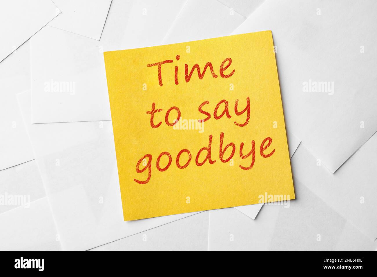Note with phrase Time to say goodbye on paper sheets, top view Stock ...