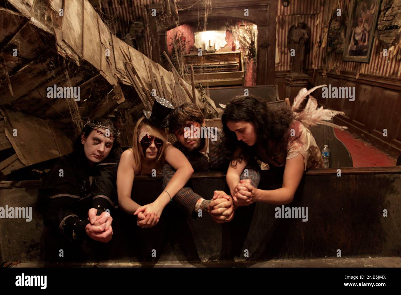 This Thursday, Sept. 22, 2011 photo shows actors in costume and makeup ...