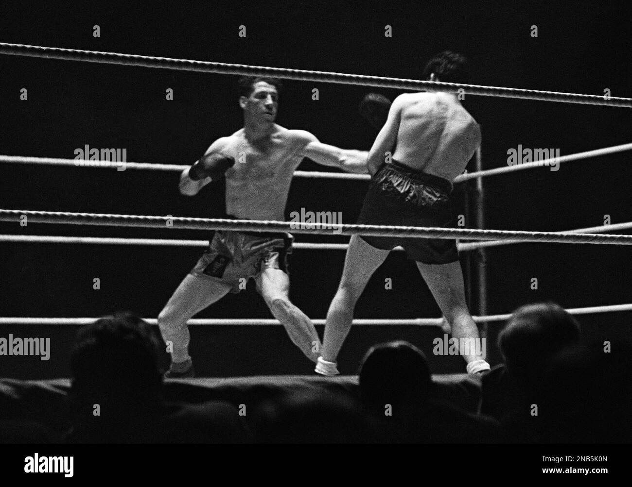 Len Harvey leading to the body of Jock McAvoy, with back to camera, in ...