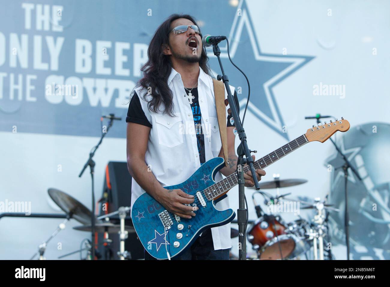 Los Lonely Boys guitarist Henry Garza performs before an NFL football ...