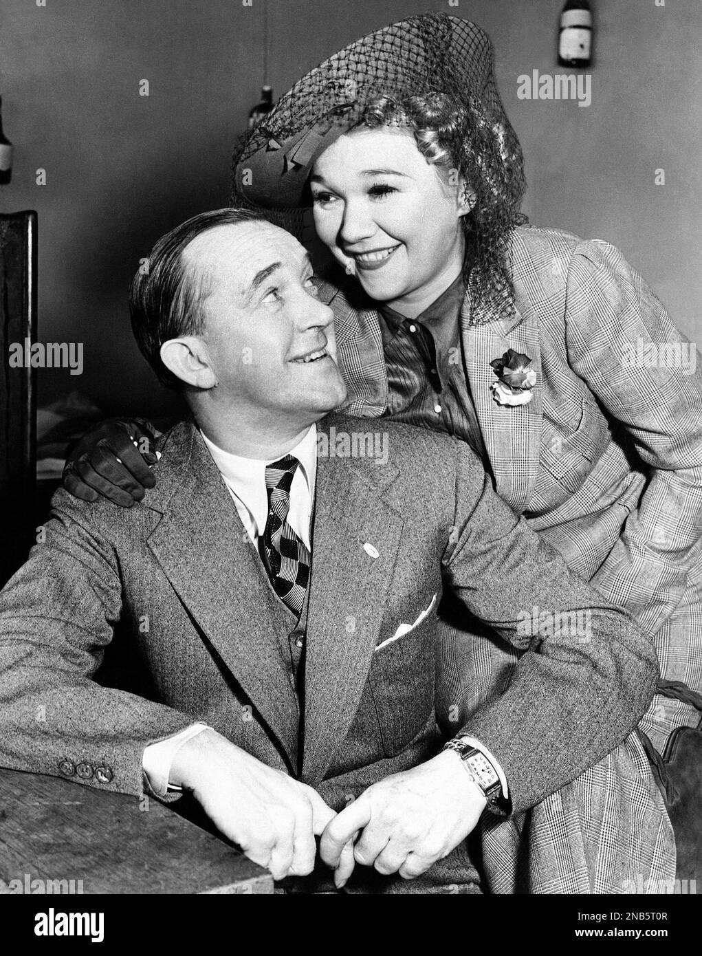 Claiming he would wind up the year with a deficit, Stan Laurel, screen comedian, with his ...